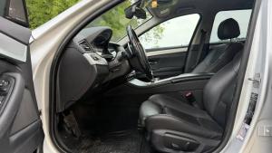 Grey BMW 518 2014 in Riga, with an engine capacity of 2.00 L and mileage of 220 thousand km for 9990 €, photo 11 on AUTOMOTO.COM.LV