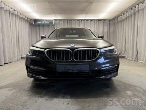 Grey BMW 518 2018 in Riga, with an engine capacity of 2.00 L and mileage of 191 thousand km for 15990 €, photo 2 on AUTOMOTO.COM.LV