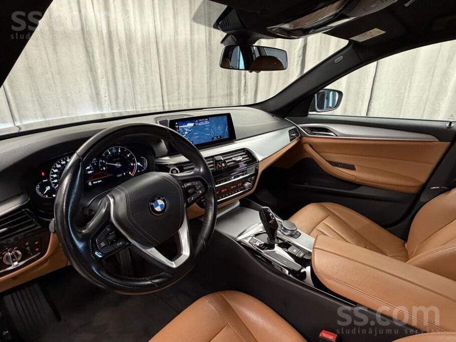 Grey BMW 518 2018 in Riga, with an engine capacity of 2.00 L and mileage of 191 thousand km for 15990 €, photo 7 on AUTOMOTO.COM.LV