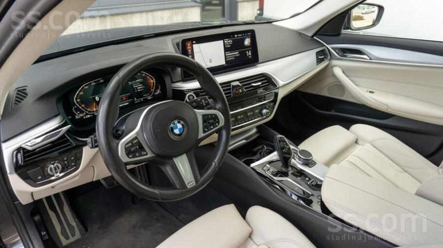 Grey BMW 518 2021 in Riga, with an engine capacity of 2.00 L and mileage of 182 thousand km for 25490 €, photo 11 on AUTOMOTO.COM.LV