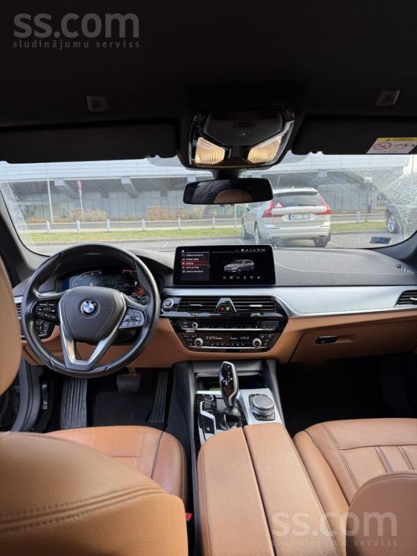 Grey BMW 518 2021 in Riga, with an engine capacity of 2.00 L and mileage of 193 thousand km for 22200 €, photo 4 on AUTOMOTO.COM.LV
