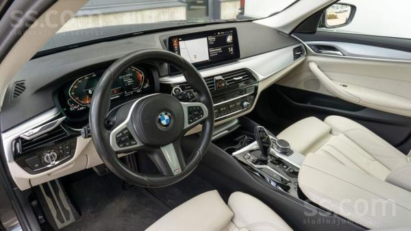 Grey BMW 518 2021 in Riga, with an engine capacity of 2.00 L and mileage of 182 thousand km for 21990 €, photo 9 on AUTOMOTO.COM.LV
