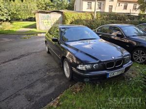Black BMW 520 1996 in Riga, with an engine capacity of 2.80 L and mileage of 328 thousand km for 2400 €, photo  on AUTOMOTO.COM.LV