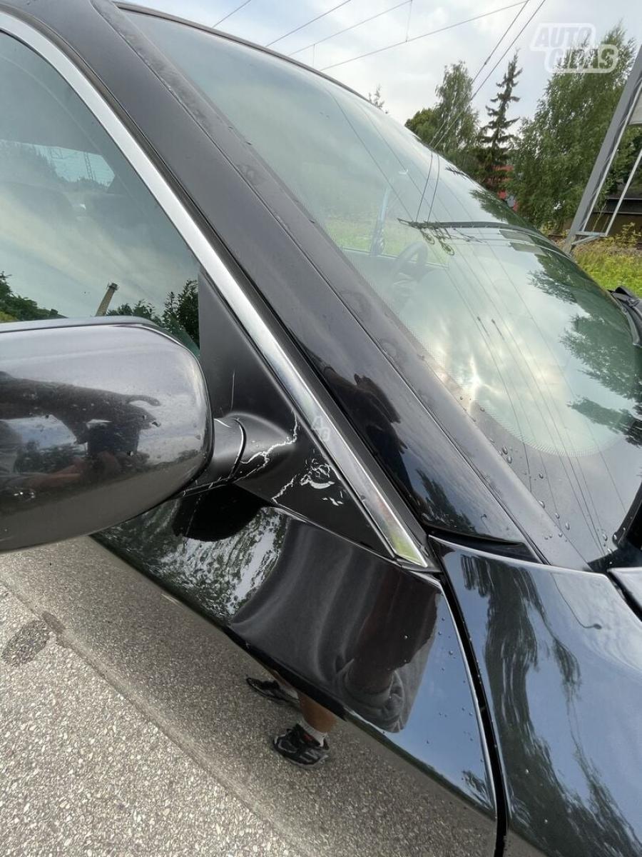 Melns BMW 520 2006 Radviliškis, ar dzinēja tilpumu 2.00 L un nobraukumu 390 tūkst. km par 3100 €, foto 13 vietnē AUTOMOTO.COM.LV