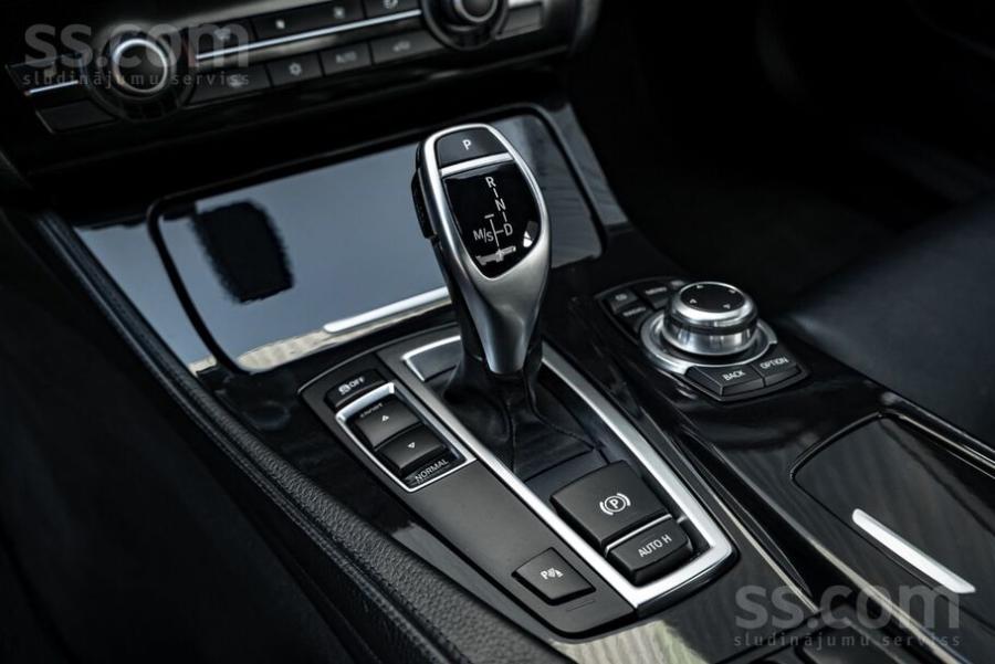 Black BMW 520 2011 in Riga, with an engine capacity of 2.00 L and mileage of 0 thousand km for 13300 €, photo 23 on AUTOMOTO.COM.LV