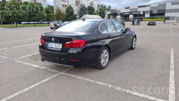 Black BMW 520 2011 in Riga, with an engine capacity of 2.00 L and mileage of 212 thousand km for 8300 €, photo 5 on AUTOMOTO.COM.LV