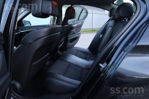 Black BMW 520 2013 in Riga, with an engine capacity of 2.00 L and mileage of 357 thousand km for 7490 €, photo 13 on AUTOMOTO.COM.LV