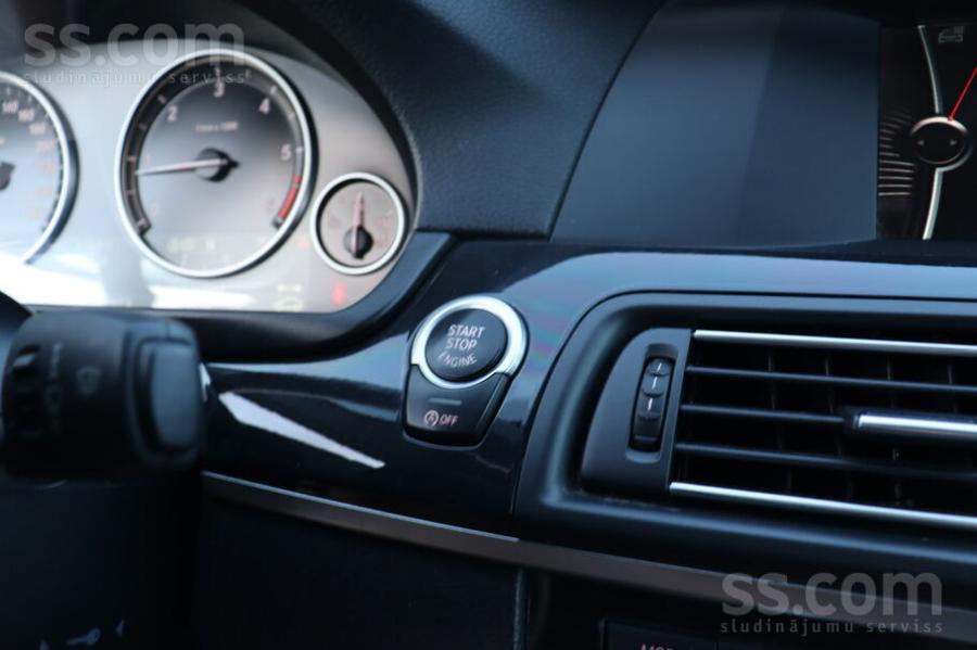 Black BMW 520 2013 in Riga, with an engine capacity of 2.00 L and mileage of 357 thousand km for 7490 €, photo 18 on AUTOMOTO.COM.LV