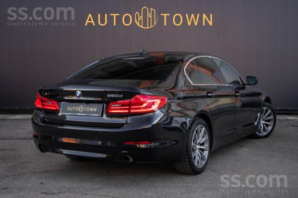 Black BMW 520 2017 in Riga, with an engine capacity of 2.00 L and mileage of 284 thousand km for 18990 €, photo 4 on AUTOMOTO.COM.LV