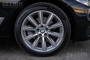 Black BMW 520 2017 in Riga, with an engine capacity of 2.00 L and mileage of 284 thousand km for 18990 €, photo 8 on AUTOMOTO.COM.LV