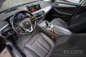 Black BMW 520 2017 in Riga, with an engine capacity of 2.00 L and mileage of 284 thousand km for 18990 €, photo 12 on AUTOMOTO.COM.LV