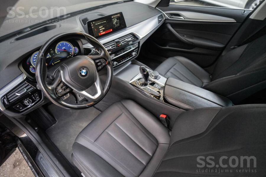 Black BMW 520 2017 in Riga, with an engine capacity of 2.00 L and mileage of 284 thousand km for 18990 €, photo 12 on AUTOMOTO.COM.LV