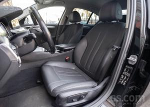 Black BMW 520 2017 in Riga, with an engine capacity of 2.00 L and mileage of 284 thousand km for 18990 €, photo 13 on AUTOMOTO.COM.LV