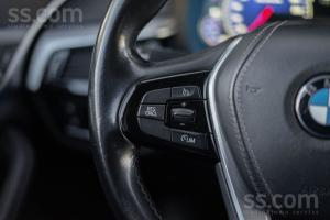 Black BMW 520 2017 in Riga, with an engine capacity of 2.00 L and mileage of 284 thousand km for 18990 €, photo 16 on AUTOMOTO.COM.LV