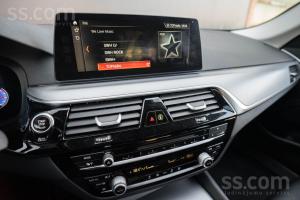 Black BMW 520 2017 in Riga, with an engine capacity of 2.00 L and mileage of 284 thousand km for 18990 €, photo 20 on AUTOMOTO.COM.LV