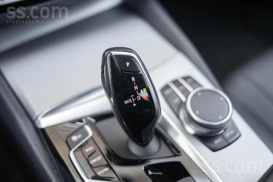 Black BMW 520 2017 in Riga, with an engine capacity of 2.00 L and mileage of 284 thousand km for 18990 €, photo 26 on AUTOMOTO.COM.LV