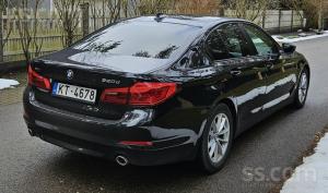 Black BMW 520 2017 in Riga, with an engine capacity of 2.00 L and mileage of 123 thousand km for 21000 €, photo 4 on AUTOMOTO.COM.LV