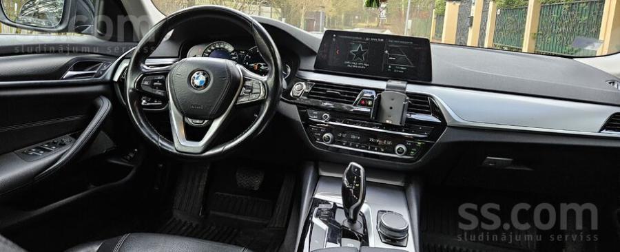 Black BMW 520 2017 in Riga, with an engine capacity of 2.00 L and mileage of 123 thousand km for 21000 €, photo 10 on AUTOMOTO.COM.LV