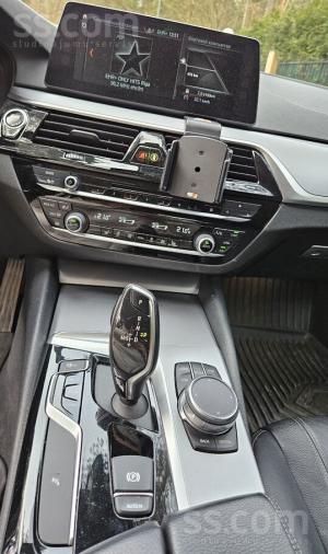 Black BMW 520 2017 in Riga, with an engine capacity of 2.00 L and mileage of 123 thousand km for 21000 €, photo 13 on AUTOMOTO.COM.LV