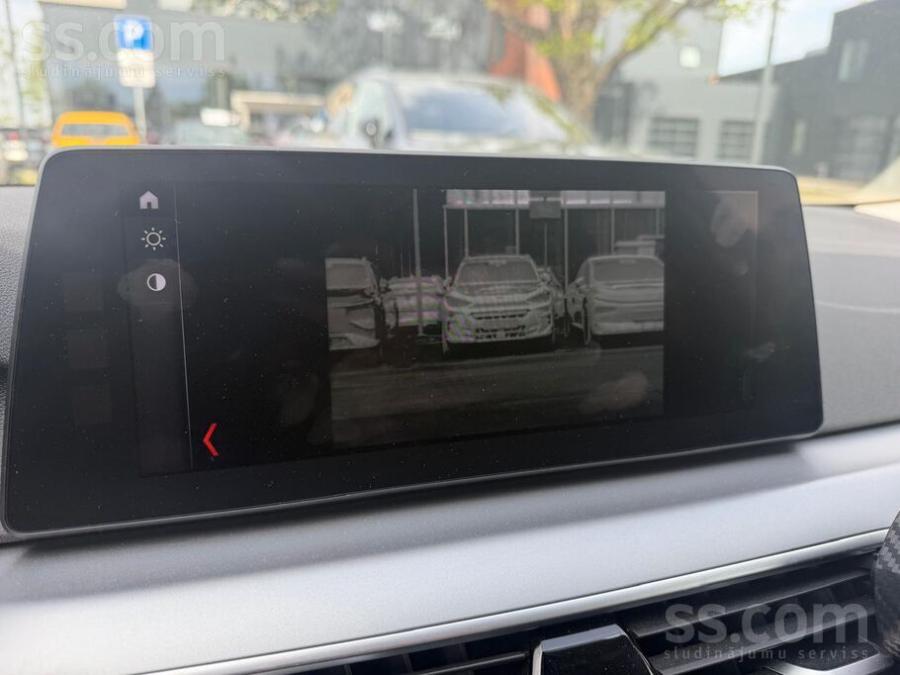 Black BMW 520 2017 in Riga, with an engine capacity of 2.00 L and mileage of 117 thousand km for 20900 €, photo 11 on AUTOMOTO.COM.LV