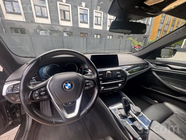 Black BMW 520 2017 in Riga, with an engine capacity of 2.00 L and mileage of 135 thousand km for 23500 €, photo 10 on AUTOMOTO.COM.LV