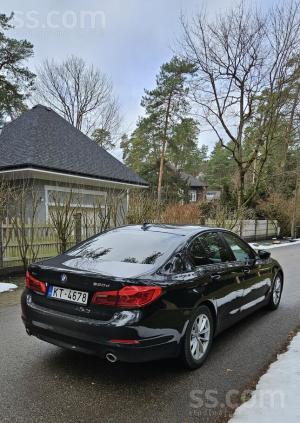 Black BMW 520 2017 in Riga, with an engine capacity of 2.00 L and mileage of 126 thousand km for 20500 €, photo 4 on AUTOMOTO.COM.LV