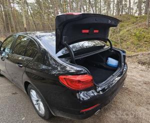 Black BMW 520 2017 in Riga, with an engine capacity of 2.00 L and mileage of 126 thousand km for 20500 €, photo 8 on AUTOMOTO.COM.LV