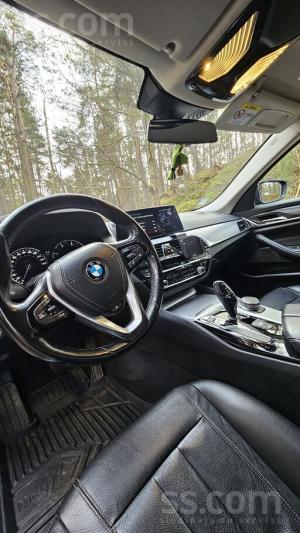Black BMW 520 2017 in Riga, with an engine capacity of 2.00 L and mileage of 126 thousand km for 20500 €, photo 9 on AUTOMOTO.COM.LV