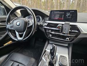 Black BMW 520 2017 in Riga, with an engine capacity of 2.00 L and mileage of 126 thousand km for 20500 €, photo 10 on AUTOMOTO.COM.LV
