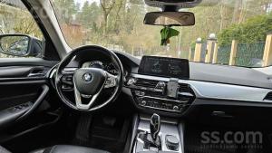 Black BMW 520 2017 in Riga, with an engine capacity of 2.00 L and mileage of 126 thousand km for 20500 €, photo 12 on AUTOMOTO.COM.LV