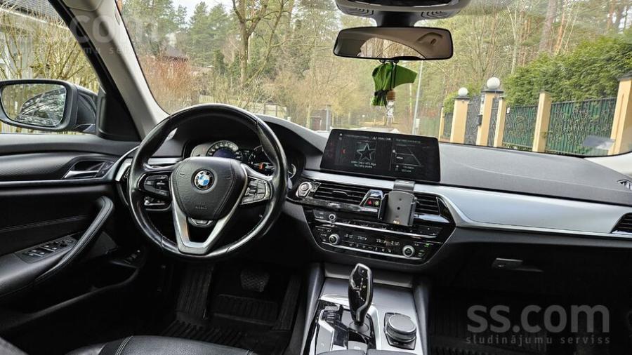 Black BMW 520 2017 in Riga, with an engine capacity of 2.00 L and mileage of 126 thousand km for 20500 €, photo 12 on AUTOMOTO.COM.LV