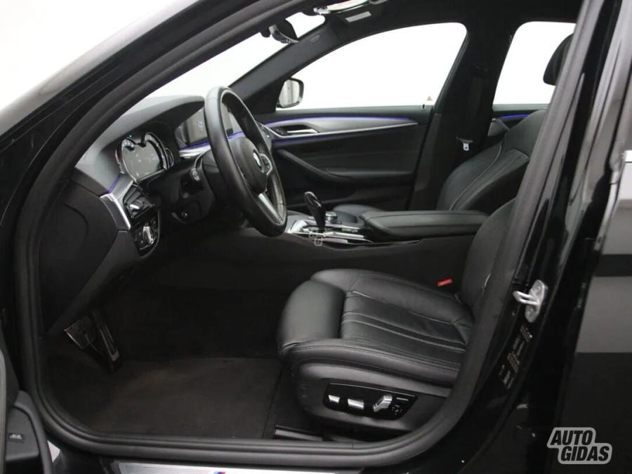 Black BMW 520 2018 in Vilnius, with an engine capacity of 2.00 L and mileage of 201 thousand km for 22499 €, photo 5 on AUTOMOTO.COM.LV