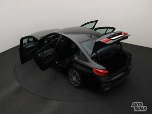 Black BMW 520 2018 in Vilnius, with an engine capacity of 2.00 L and mileage of 201 thousand km for 22499 €, photo 14 on AUTOMOTO.COM.LV