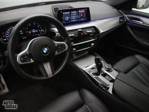 Black BMW 520 2018 in Vilnius, with an engine capacity of 2.00 L and mileage of 201 thousand km for 22499 €, photo 17 on AUTOMOTO.COM.LV