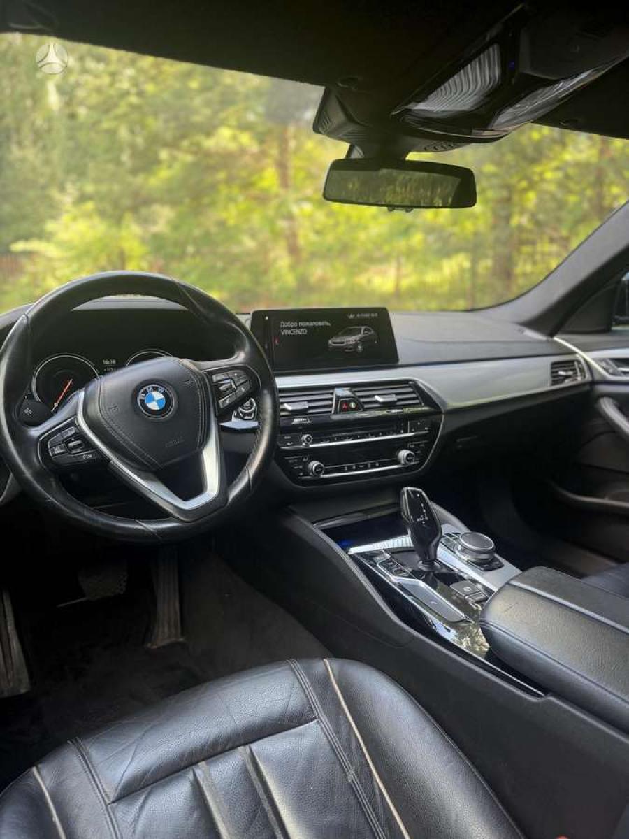 Black BMW 520 2018 in Vilnius, with an engine capacity of 2.00 L and mileage of 230 thousand km for 17500 €, photo 14 on AUTOMOTO.COM.LV