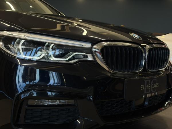 Black BMW 520 2019 in Riga, with an engine capacity of 2.00 L and mileage of 168 thousand km for 25490 €, photo 3 on AUTOMOTO.COM.LV