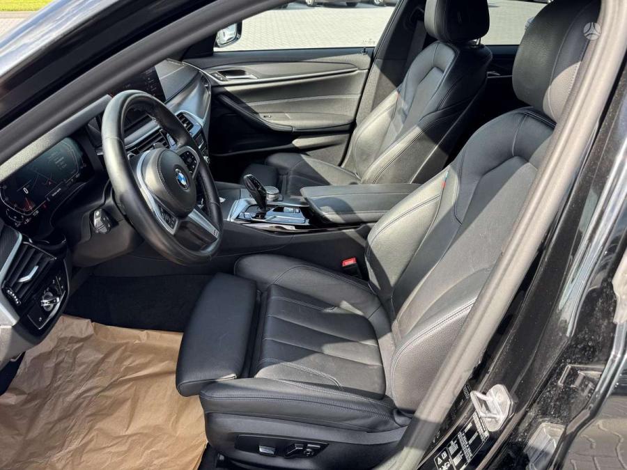 Black BMW 520 2021 in Telschi, with an engine capacity of 2.00 L and mileage of 210 thousand km for 23500 €, photo 20 on AUTOMOTO.COM.LV
