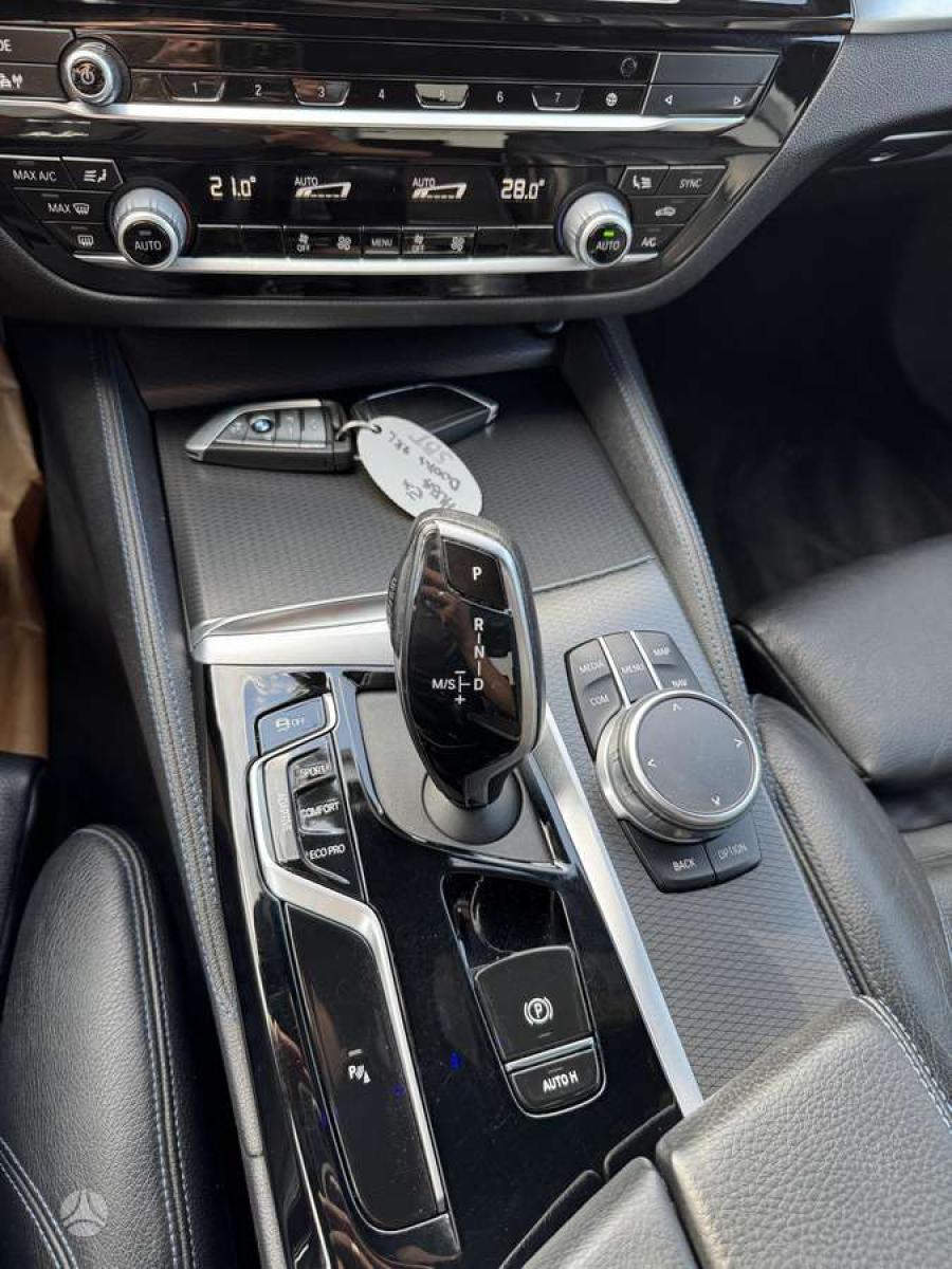 Black BMW 520 2021 in Telschi, with an engine capacity of 2.00 L and mileage of 210 thousand km for 23500 €, photo 32 on AUTOMOTO.COM.LV