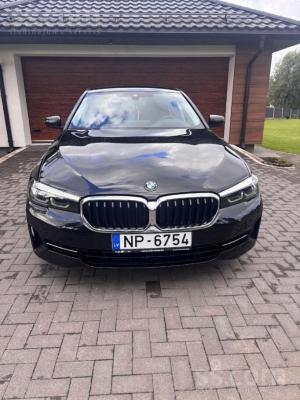 Black BMW 520 2021 in Riga, with an engine capacity of 2.00 L and mileage of 72 thousand km for 35000 €, photo 4 on AUTOMOTO.COM.LV