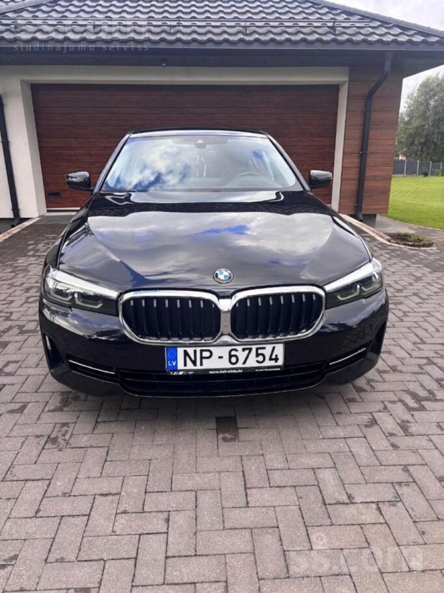 Black BMW 520 2021 in Riga, with an engine capacity of 2.00 L and mileage of 72 thousand km for 35000 €, photo 4 on AUTOMOTO.COM.LV