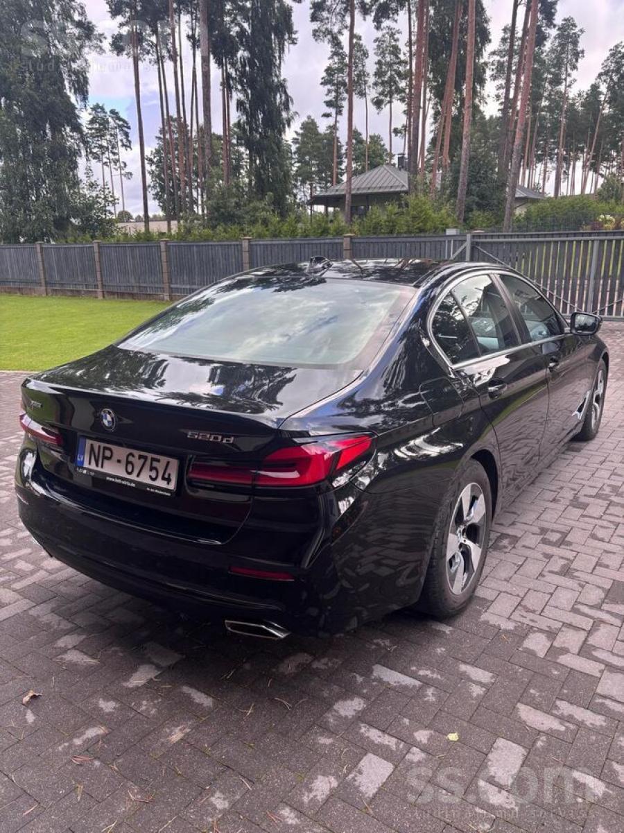 Black BMW 520 2021 in Riga, with an engine capacity of 2.00 L and mileage of 72 thousand km for 35000 €, photo 5 on AUTOMOTO.COM.LV