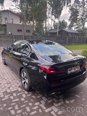 Black BMW 520 2021 in Riga, with an engine capacity of 2.00 L and mileage of 72 thousand km for 35000 €, photo 6 on AUTOMOTO.COM.LV