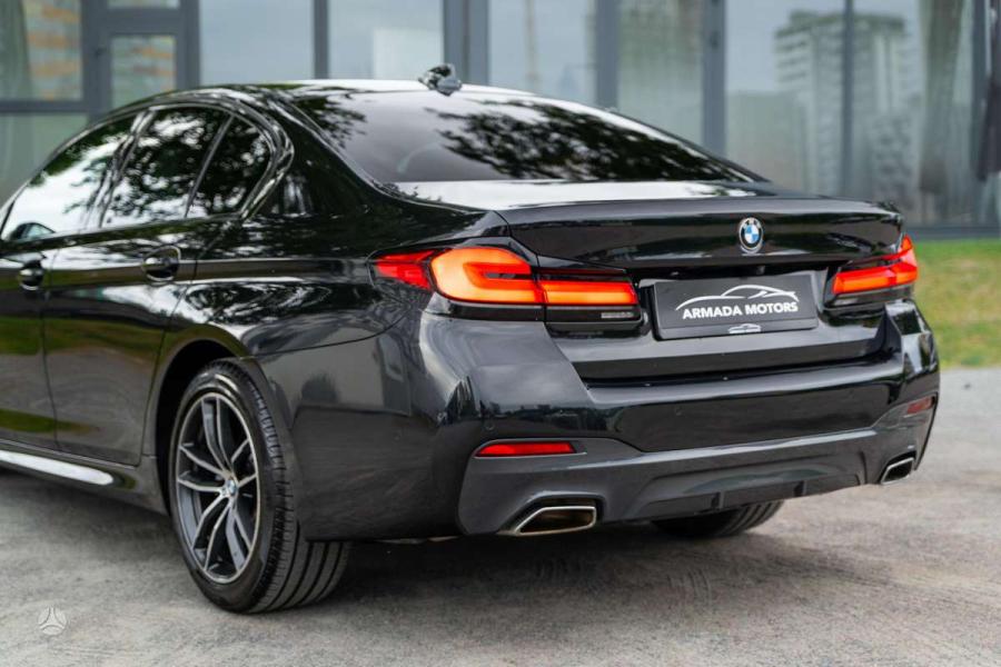 Black BMW 520 2021 in Vilnius, with an engine capacity of 2.00 L and mileage of 50 thousand km for 35900 €, photo 16 on AUTOMOTO.COM.LV