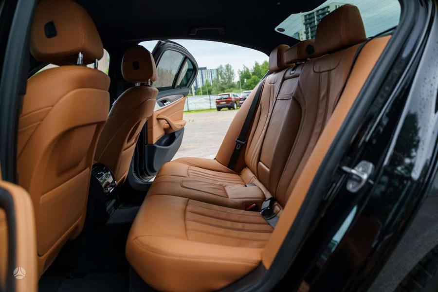 Black BMW 520 2021 in Vilnius, with an engine capacity of 2.00 L and mileage of 50 thousand km for 35900 €, photo 26 on AUTOMOTO.COM.LV
