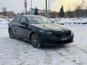 Black BMW 520 2023 in Siauliai, with an engine capacity of 2.00 L and mileage of 34 thousand km for 54500 €, photo  on AUTOMOTO.COM.LV