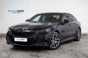 Black BMW 520 2023 in Vilnius, with an engine capacity of 2.00 L and mileage of 54 thousand km for 51991 €, photo  on AUTOMOTO.COM.LV