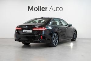 Black BMW 520 2024 in Vilnius, with an engine capacity of 2.00 L and mileage of 59 thousand km for 51000 €, photo 4 on AUTOMOTO.COM.LV