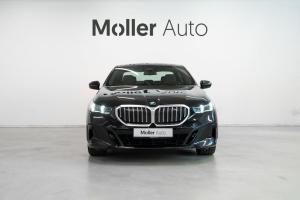Black BMW 520 2024 in Vilnius, with an engine capacity of 2.00 L and mileage of 59 thousand km for 51000 €, photo 6 on AUTOMOTO.COM.LV