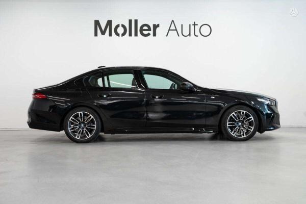 Black BMW 520 2024 in Vilnius, with an engine capacity of 2.00 L and mileage of 59 thousand km for 51000 €, photo 4 on AUTOMOTO.COM.LV