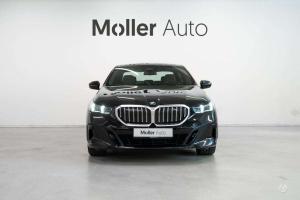 Black BMW 520 2024 in Vilnius, with an engine capacity of 2.00 L and mileage of 59 thousand km for 51000 €, photo 6 on AUTOMOTO.COM.LV